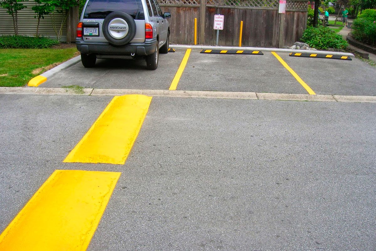 Wheel Stops & Speed Reduction Bumpers - Paving Professionals, Inc.